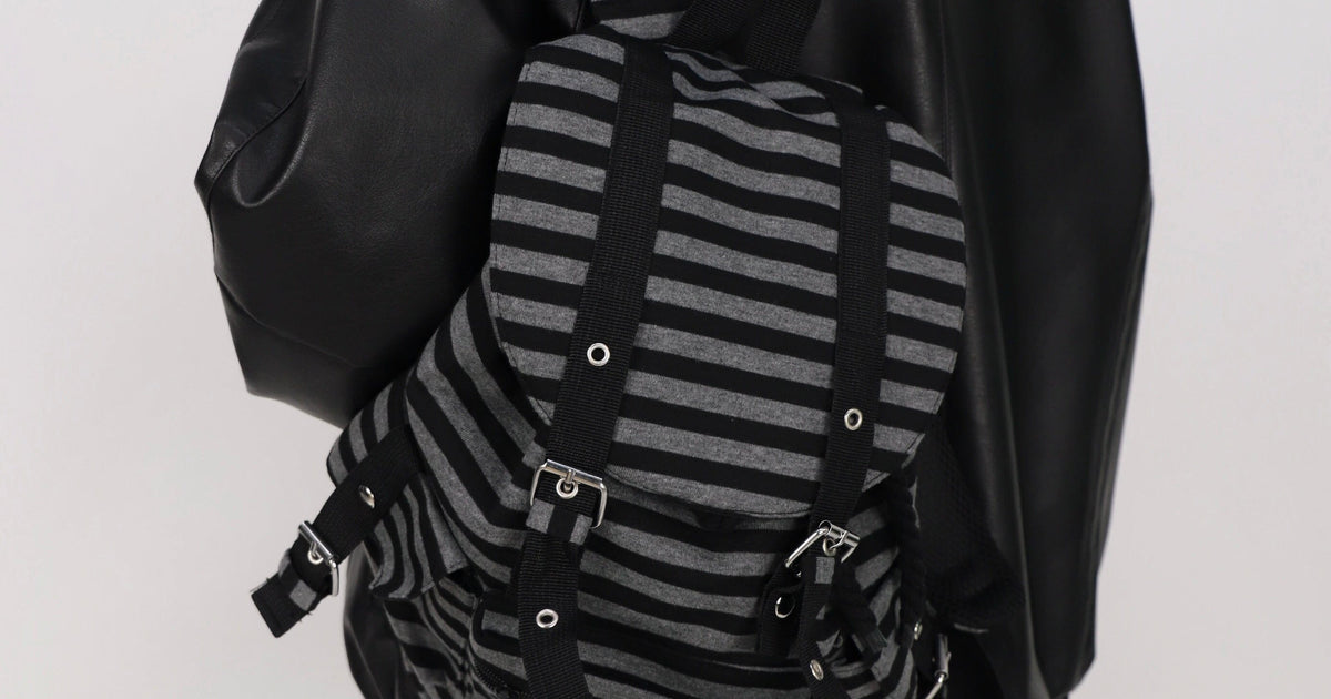 Border design flap backpack | Judin